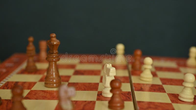 Close-up of a Strategic Chess Game in Progress with a Player Making a ...
