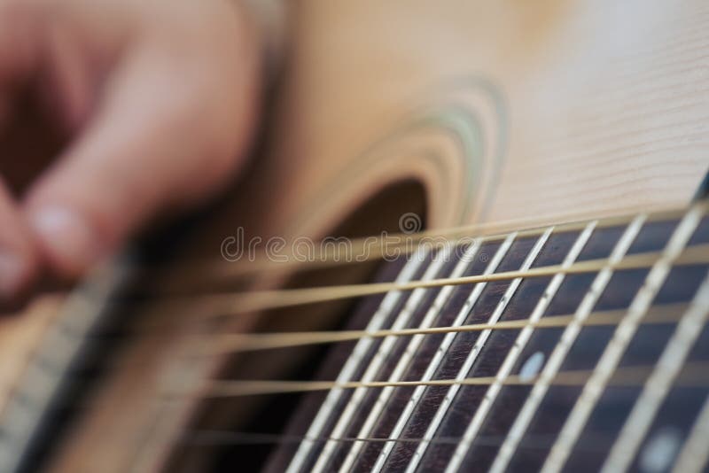 Close Up of Strings of a Guitar while Playing Stock Image - Image of ...