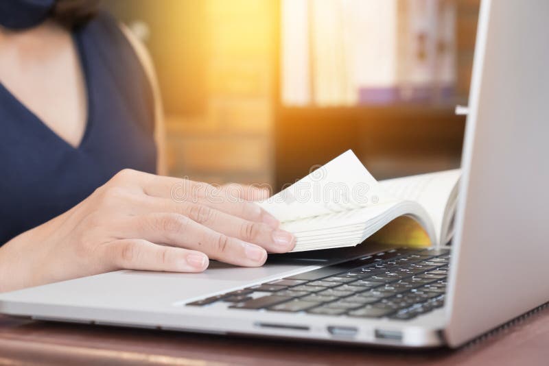 Close Up of Student Hand Reading a Book at Library Vintage Tone. Stock ...