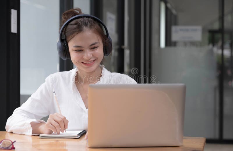 Close Up of Student Learning Online Class by Using Laptop Computer and ...