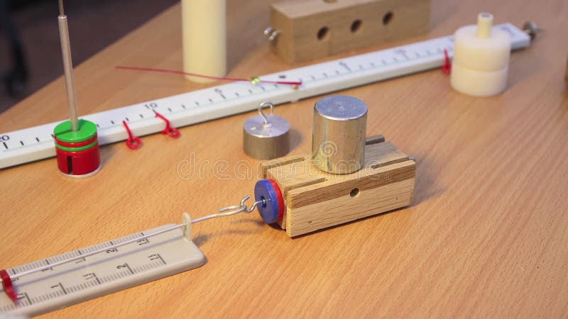 Close-up of a Student S Hands Moving a Physics Model Across a Table. Stock Footage - Video of ...