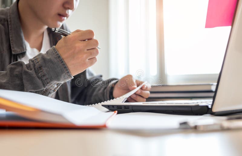 Close-up Boy Studying at Home with Tablet and Doing School Homework ...