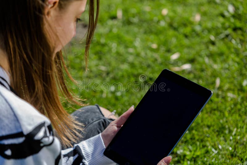 Close Up Student with a Tablet Stock Image - Image of space, outdoor ...