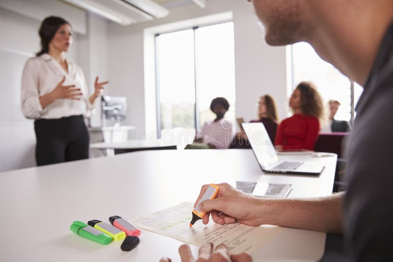 Close Up of Student Using Highlighter Pens in Lecture Stock Photo ...