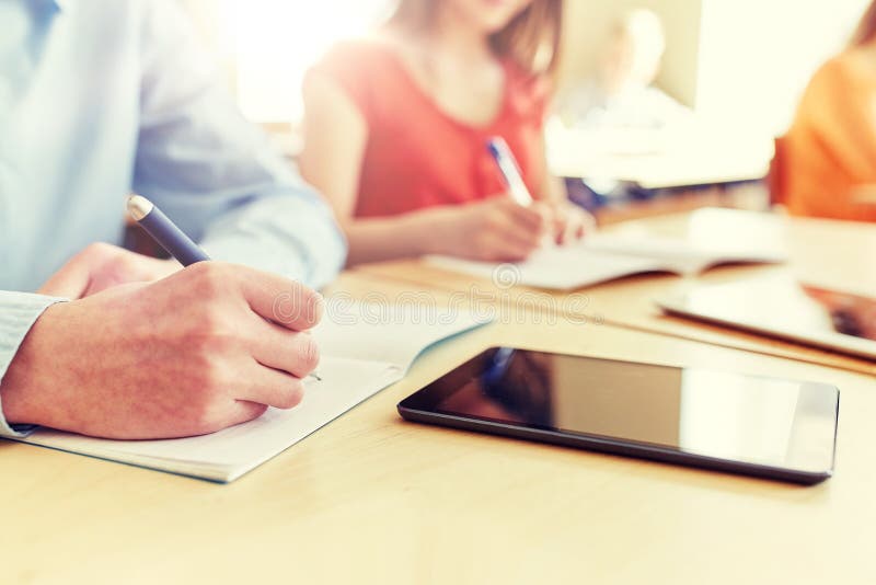 Close Up of Students Tablet Pc Writing at School Stock Photo - Image of ...