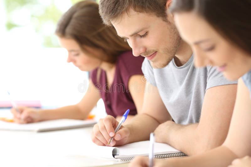 Close Up of Students Taking Notes at Classroom Stock Image - Image of ...