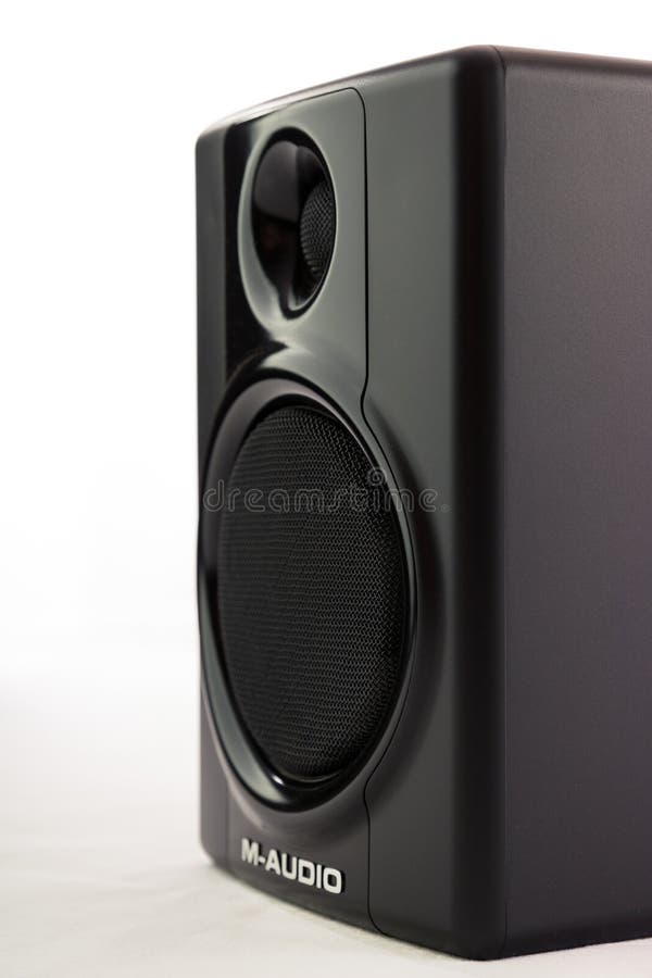 A Close Up Studio Speaker In Front Of A White Background. - Side ...