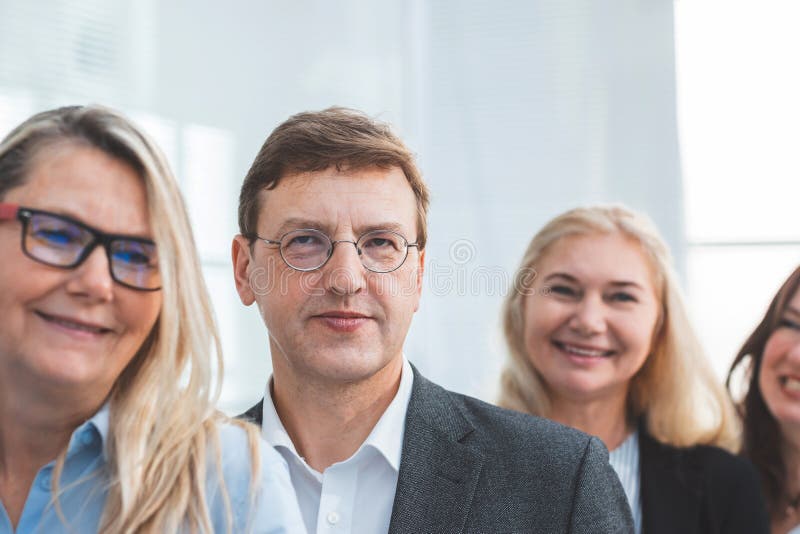 Close Up. Group Successful Employees Standing Together Stock Photo ...