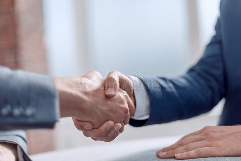 Close Up. Successful Financial Partners Shaking Hands Stock Photo ...