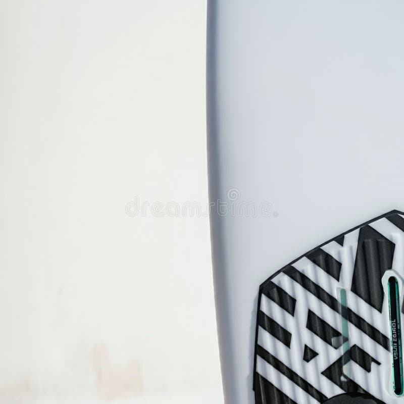 Close-up of a Surfboard Featuring a Sleek, White Surface. the Lower ...