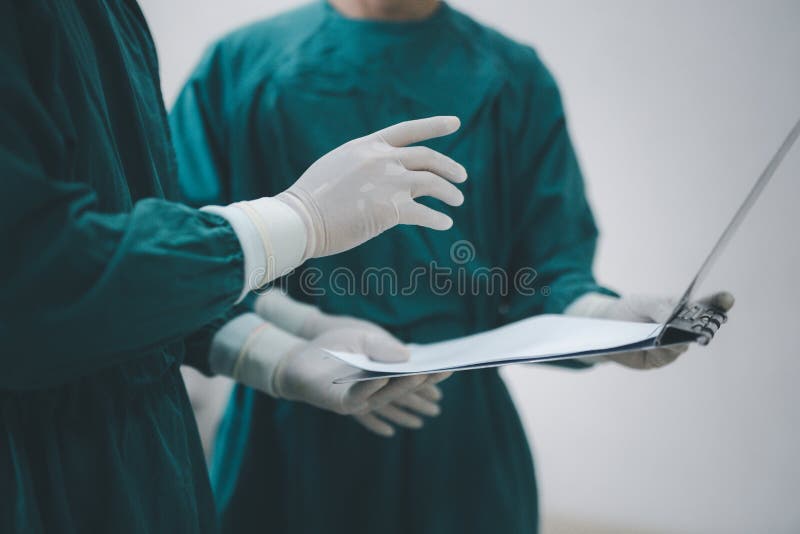 A Close-up of the Surgeon`s Hand Explaining, Planning and Holding ...