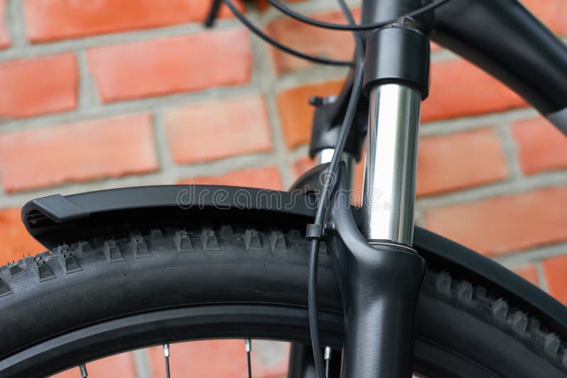 Close-up of the Suspension Fork of the Front Wheel of a Bicycle ...