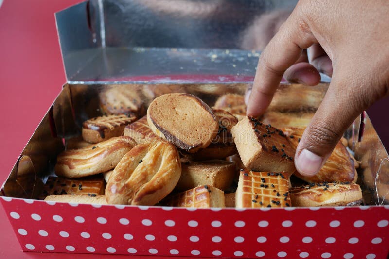 Close Up of Sweet Cookies in a Packet on Table Stock Photo - Image of ...