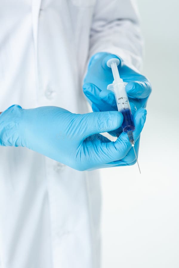 Close Up of a Syringe before Injection Stock Photo - Image of gloves ...