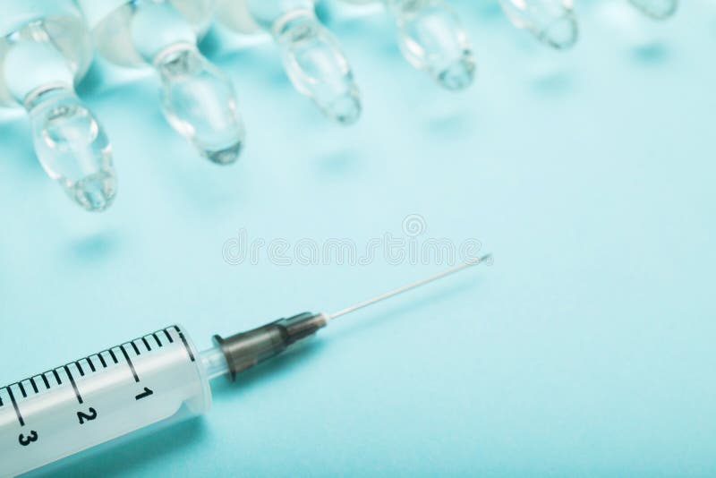 Close-up, Syringe with a Needle on the Background of Ampoules, Empty ...