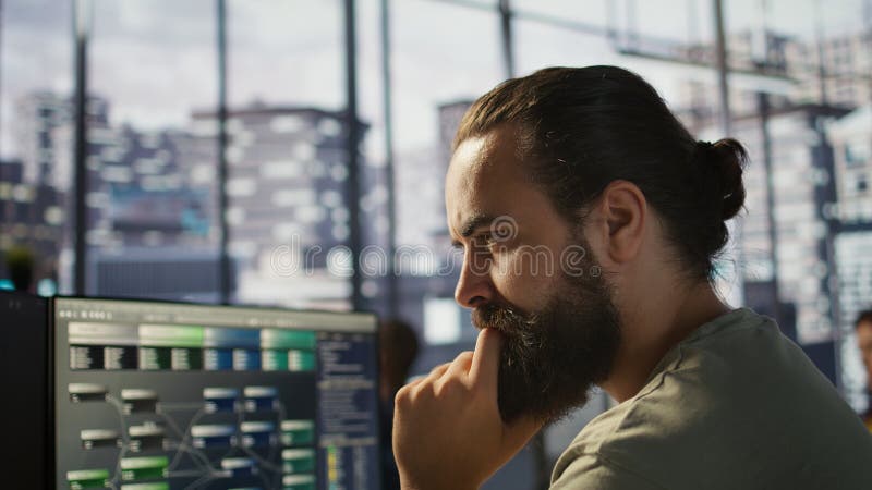 Close Up of System Administrator Transforming Data into Predictive ...
