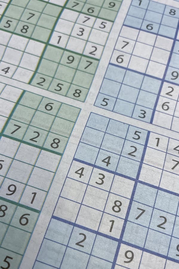 Close-up of a Table with Numbers and a Crossword Puzzle. Stock Image ...