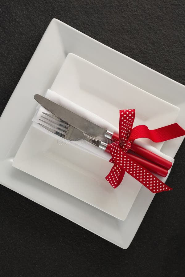 Table Setting with Square Plates and Cutlery Stock Image - Image of ...