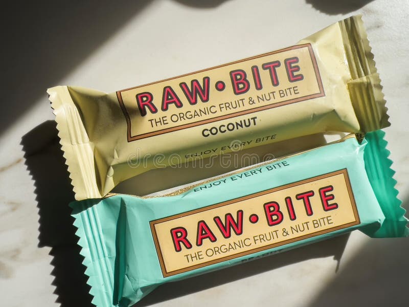 Close-up on a Table of Two Sticks of Raw Bite the Organic Fruit and Nut ...