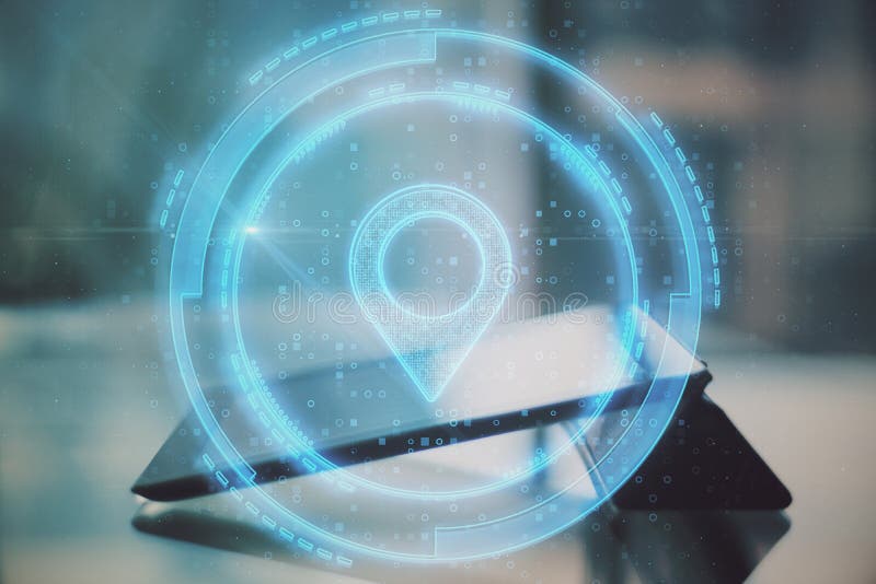 Close Up of Tablet on Desktop with Glowing Digital Map Pin on Blue ...