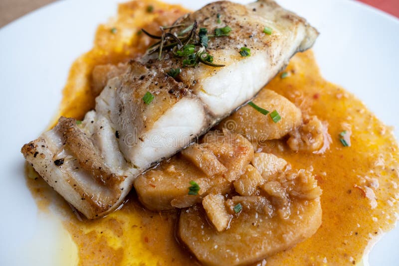 Close Up Take of a Croacker Fish Dish Cooked in the Oven with Potatoes ...