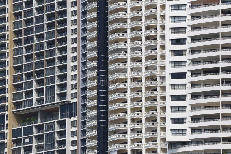 Close Up of Tall Building with a Skyscraper Background Stock Photo ...