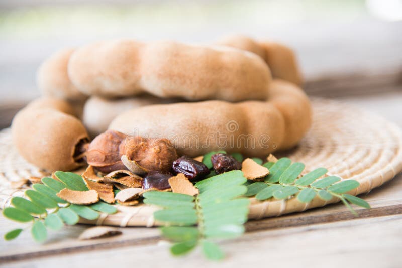 Tamarind on wood texture. stock photo. Image of seed - 109125434