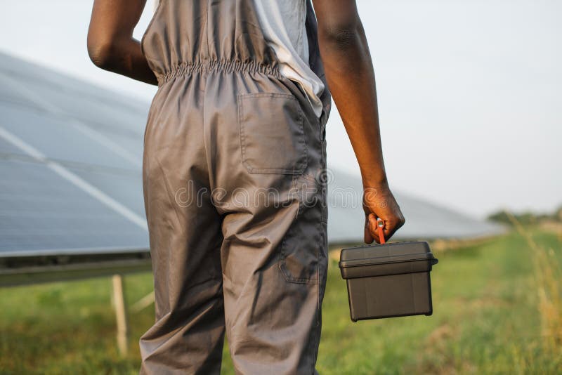 Close Up of Technician with Tools Standing on Solar Farm Stock Image ... Close Up of Technician with Tools Standing on Solar Farm Stock Image ...