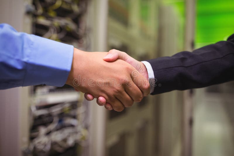 Close-up of Technicians Shaking Hands Stock Image - Image of hand ...