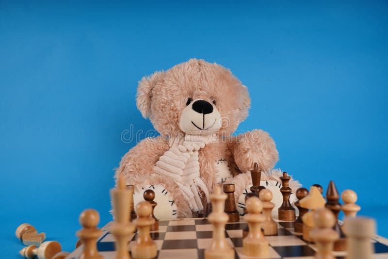 Close Up of Teddy Bear with Chess Pieces on Chessboard. Soft Plush Toy ...