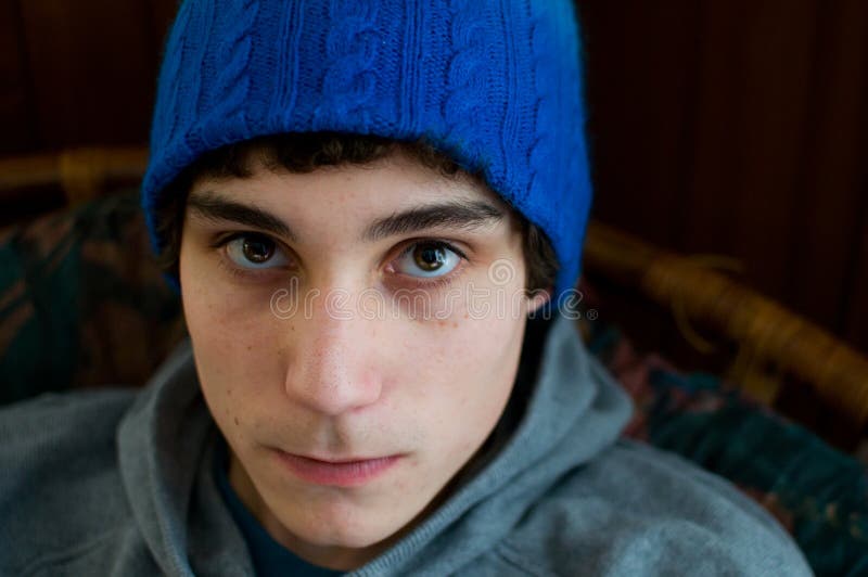 Close up of a teen boy stock photo. Image of outdoors - 16909236