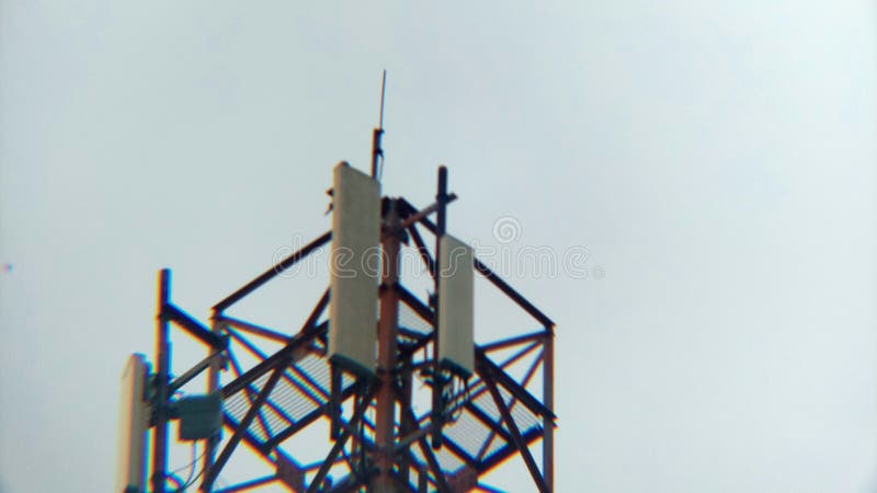 Close-Up Telephoto View of Mobile Communication Tower with Transmitters ...