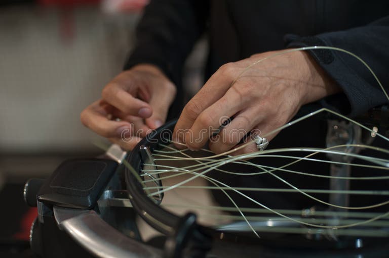 Close Up of Tennis Stringer Hands Doing Racket Stringing Stock Photo ...