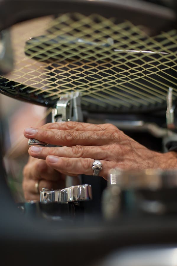 Close Up of Tennis Stringer Hands Doing Racket Stringing Stock Image ...