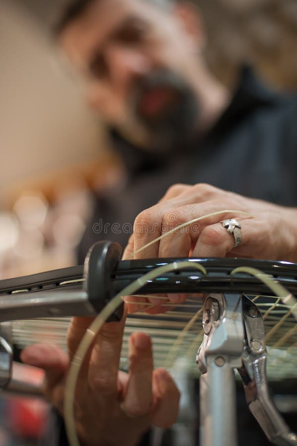 Close Up of Tennis Stringer Hands Doing Racket Stringing Stock Image ...