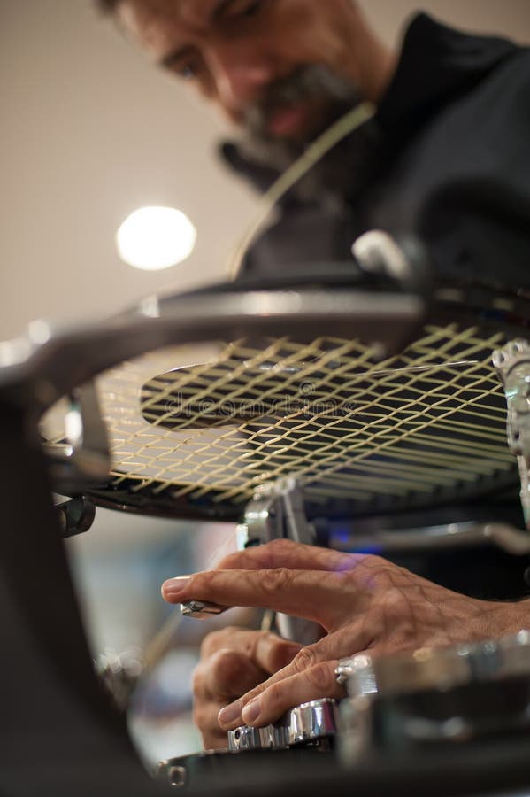 Close Up of Tennis Stringer Hands Doing Racket Stringing Stock Photo ...