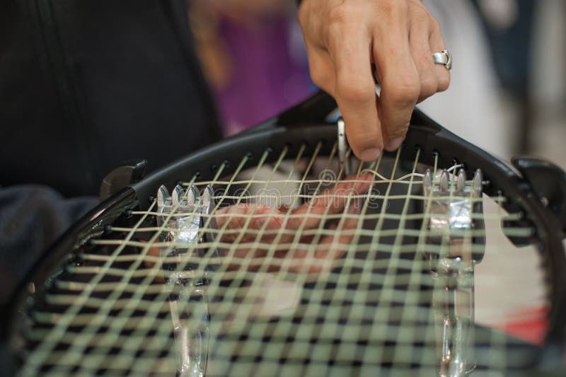 Close Up of Tennis Stringer Hands Doing Racket Stringing Stock Photo ...