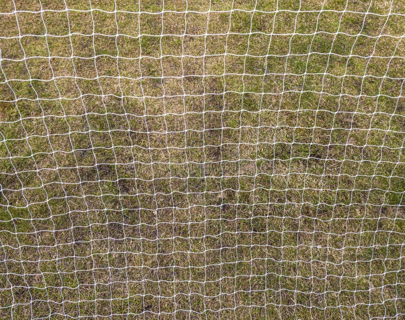 Close Up Texture Background View of Net on Grass Field Background ...