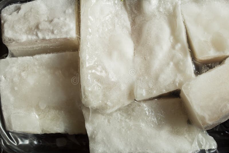 Close-up of the Texture of Frozen Cod Fillets Wrapped in a Plastic ...