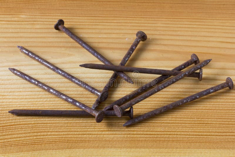 Close Up Texture of Old Rusty Nails, Rusty Nails on a Wooden Table ...