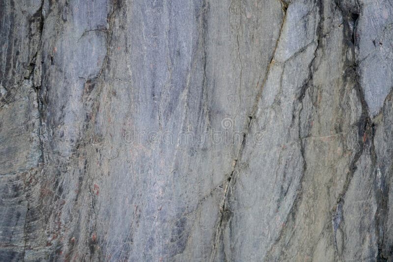 Close-up Texture of a Rough Stone Surface with Natural Patterns and ...