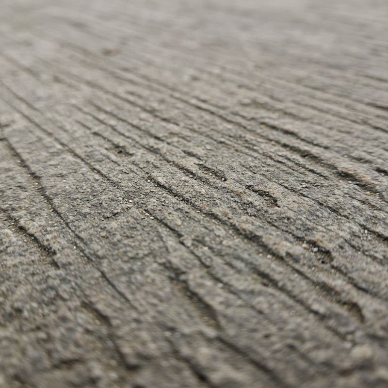 Close-up of Textured Concrete with Parallel Grooves Running Across the ...