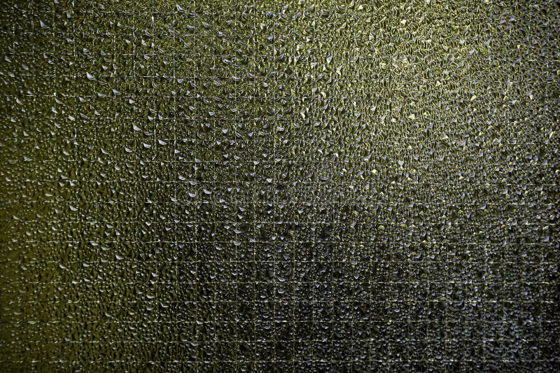 Close-up of Textured Green Glass with a Repeating Abstract Pattern ...