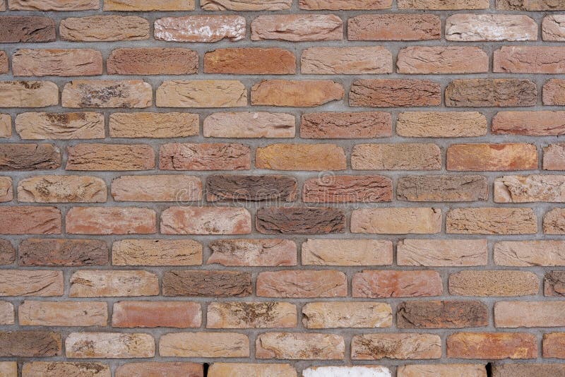 Close-up of a Textured Ground Stone Brick Wall Stock Photo - Image of ...