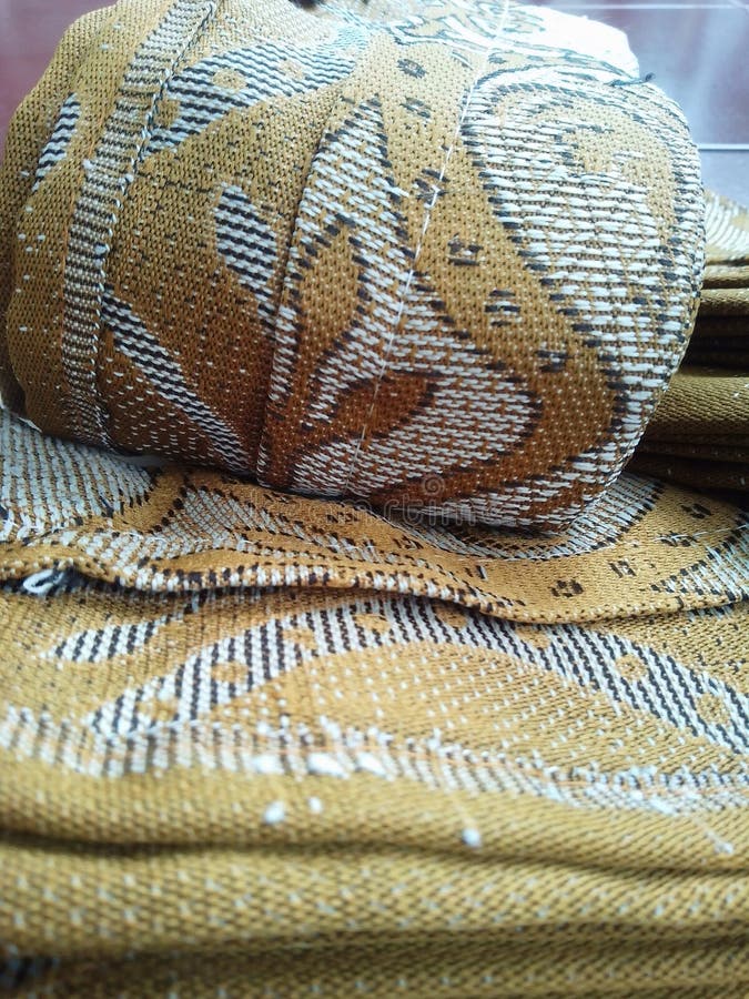 Close-Up of Textured Patterns in Coiled Fabric Rolls Stock Photo ...