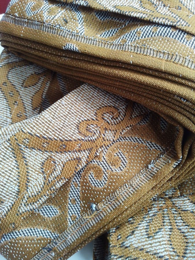 Close-Up of Textured Patterns in Coiled Fabric Rolls Stock Image ...