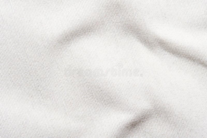 Close-up of Textured White Fabric with Natural Light and Soft Shadows ...