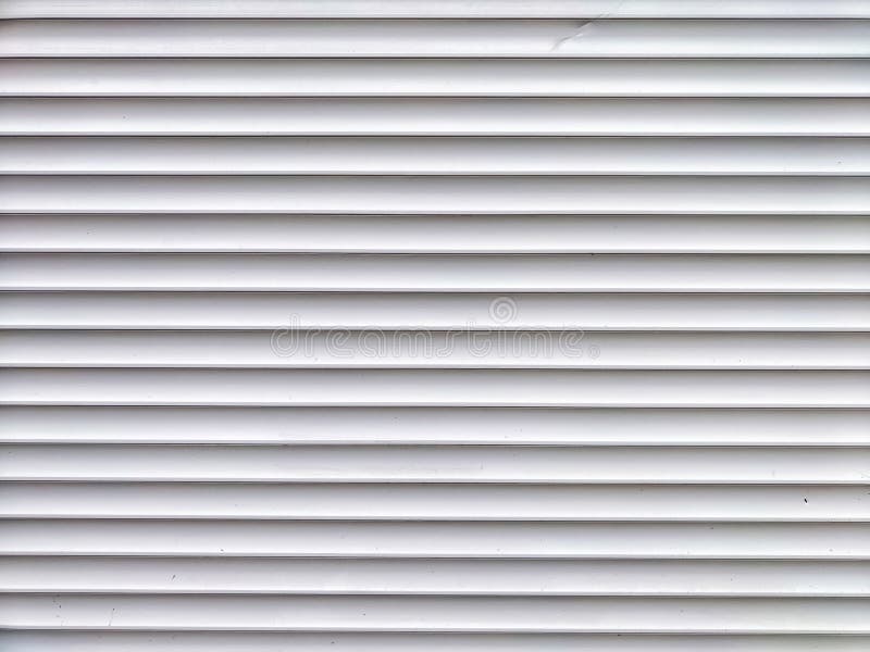 Close-up of a Textured White Rolling Shutter with Horizontal Slats in ...