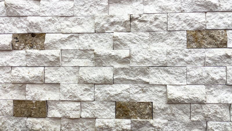 Close-up of a Textured White Stone Wall with a Mix of Rough and Smooth ...