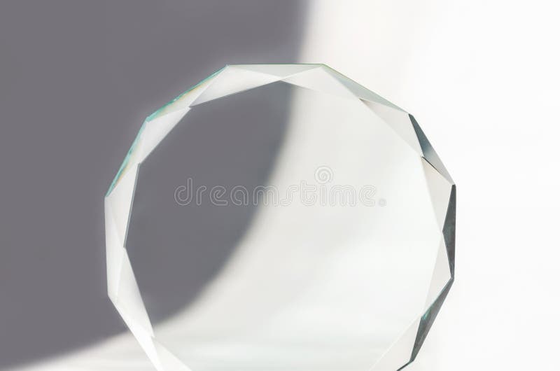 Close-up of Thick Glass Award with Highlights and Shadow on White ...
